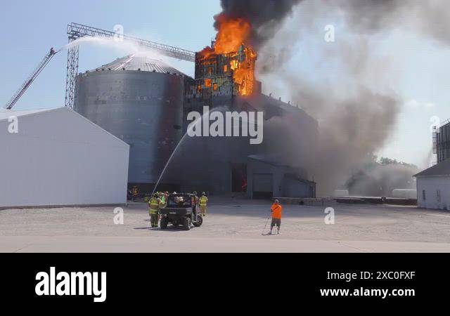 2021 - A large industrial fire in a grain silo storage facility on a ...
