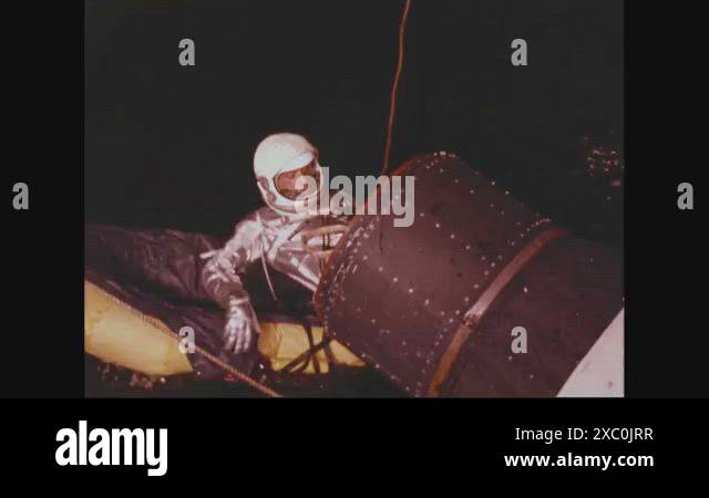 1962 - Alan Shepard gets out of an egress capsule and onto an ...