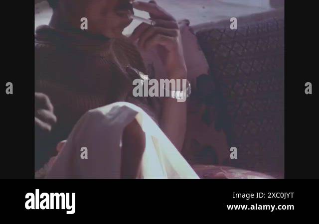 1977 - Yemeni men smoke mada'a pipes and chew khat together Stock Video ...