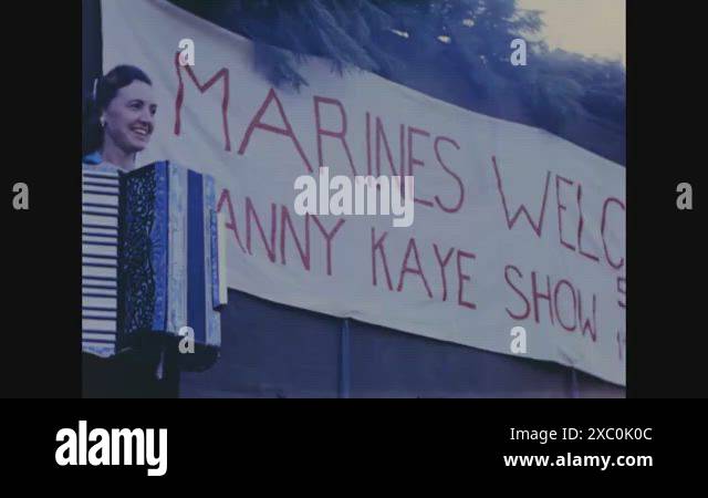 1951 - Accordion player June Brunner and comic actor Danny Kaye perform ...