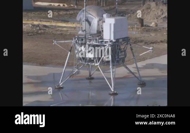 1967 - An experimental lunar landing vehicle is lowered from a tall ...