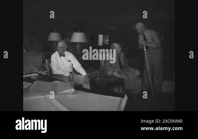 1944 - General MacArthur goes over a map with FDR and Admirals Nimitz ...