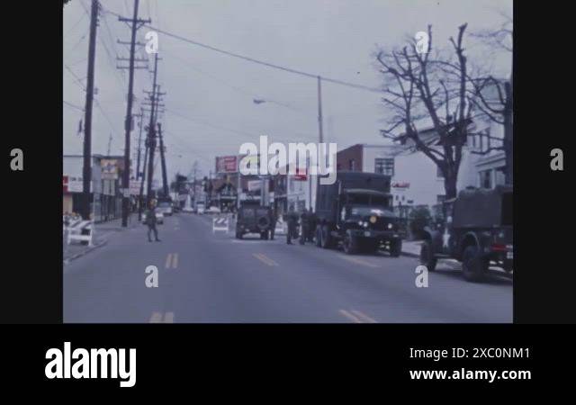 1974 - US Army vehicles are parked in an intersection in Kentucky so ...