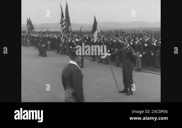 1940s - The color guard of the 82nd Airborne Division salutes and ...
