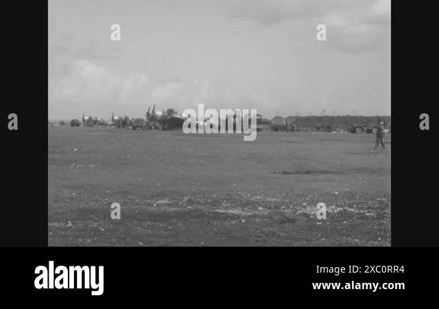 1944 - US Army Air Force ground crews and pilots work together on P-47s ...
