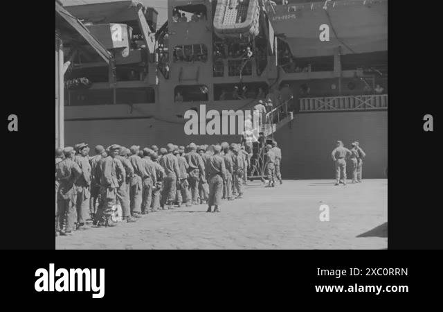 1950 - American and South Korean troops board a ship, and US Marines ...