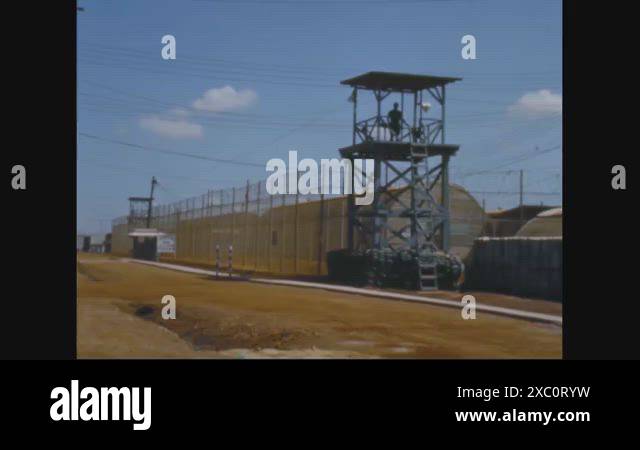 1969 - American soldiers stand in the guard towers at a POW hospital ...