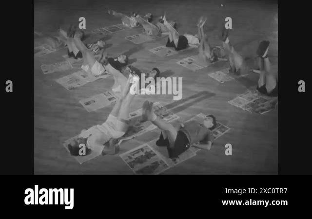 1940s - Women do exercises in the gym of a recreation center, and a ...