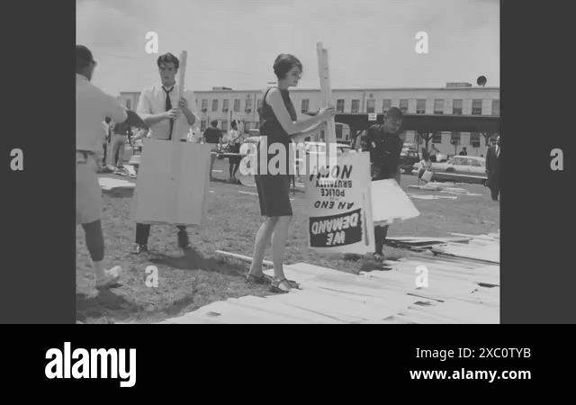 1963 - Signs are painted and structures are built and a microphone test ...