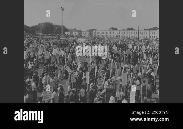 1963- Civil rights activists are shown marching during the March on ...
