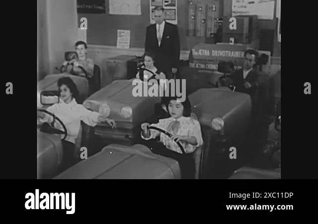 1950s - Drivers ed students use driving simulators in class, learning ...