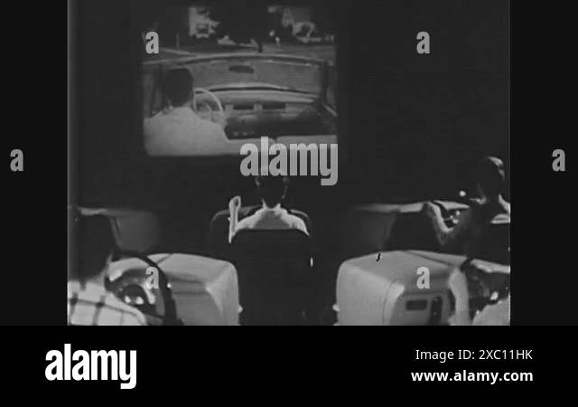 1950s - Drivers ed students use driving simulators in class Stock Video ...