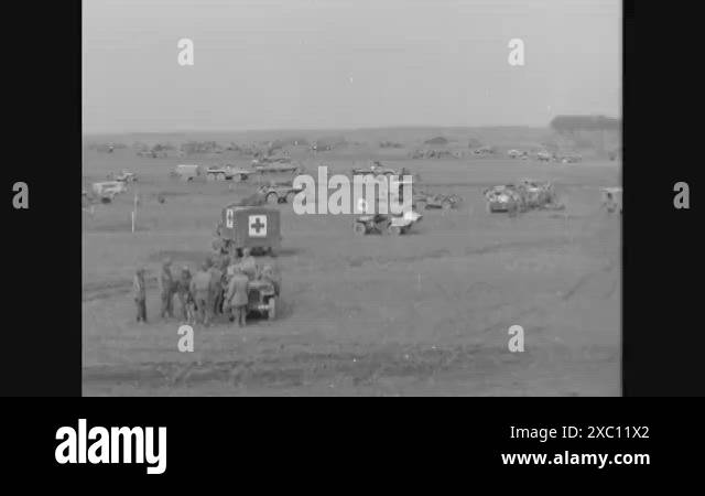 1945 - Armored vehicles and ambulances of the 5th Armored Division are ...