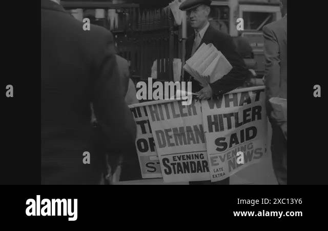 1940 - Supporters of fascist Oswald Mosley pass out antiwar flyers in ...