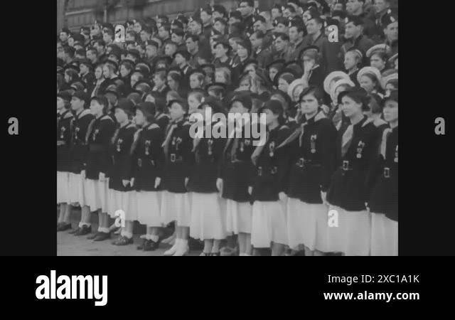 1937 - A German military parade passing by Hitler and Mussolini ...