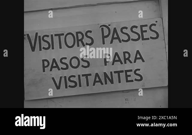 1940s - A trading post and other buildings and road signs are seen on ...