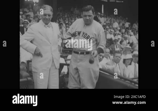 1933 - Babe Ruth presents a baseball bat to War Secretary Dern, who ...