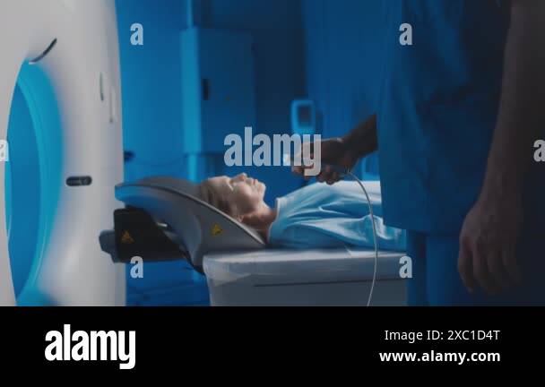 Slowmo midsection of unrecognizable male imaging specialist in uniform ...