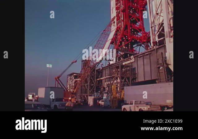 1971 - A crane is operated at the base of the Apollo 14 rocket at the ...