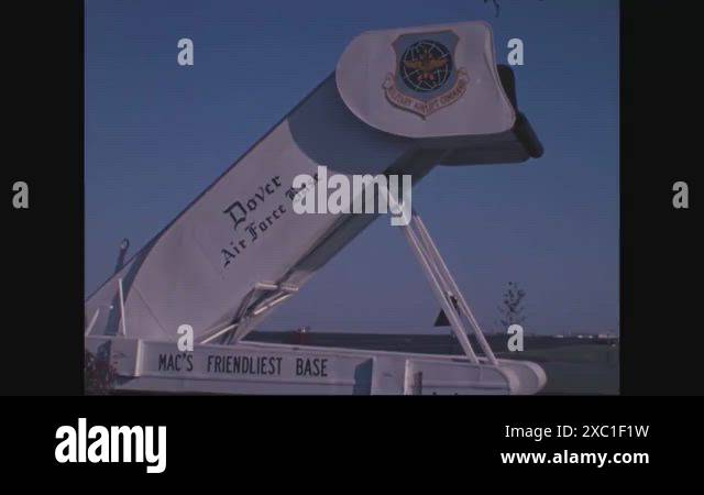 1973 - An airstair sits at Dover Air Force Base while planes are ...