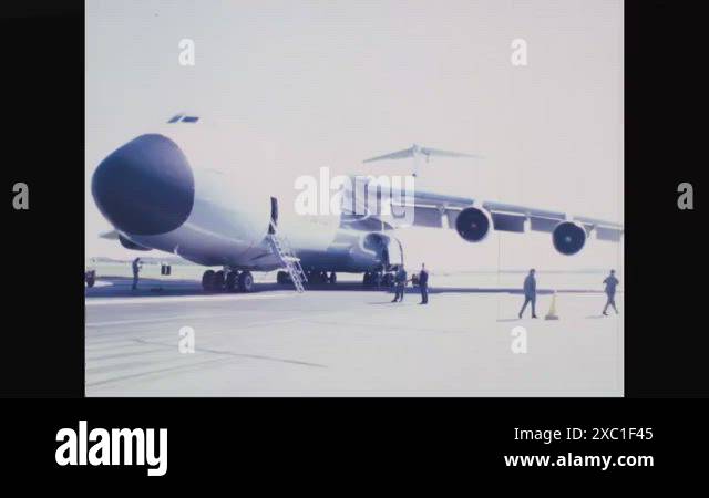 1973 - Activity around a C-141A aircraft at Dover Air Force Base Stock ...