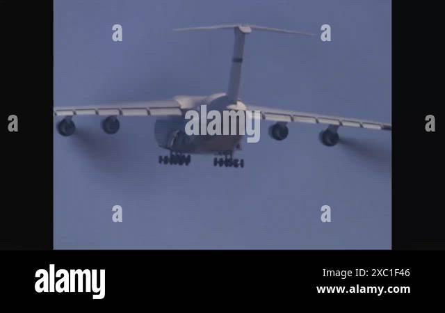 1973 - A USAF cargo plane lands at Dover Air Force Base and taxis close ...