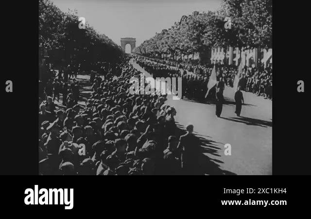1943 - A Nazi military parade moves down the Champs-Elysees in Paris ...