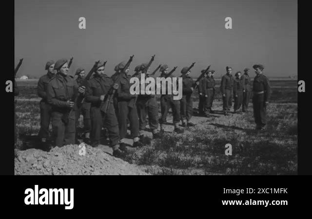 1945 - Men of the British Army's Jewish Brigade bury and mourn one of ...