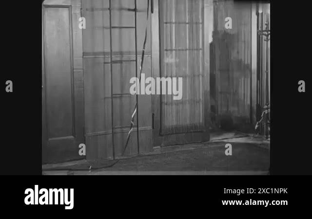 USA - 1925 - In this comedy film, a man climbs a ladder and dives into ...