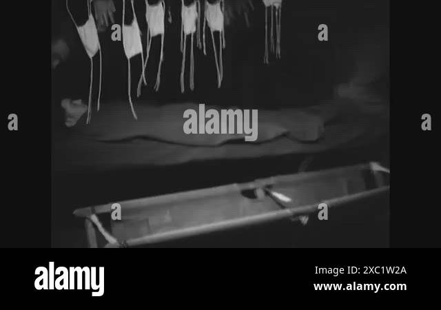1951 - MASH doctors give a blood transfusion to a shock patient Stock ...