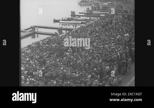 1936 - The eight-man rowing competition in the summer Olympics takes ...