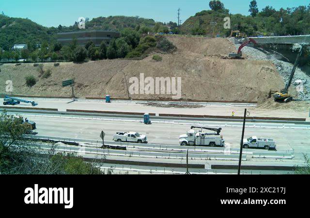 Pan left to right over an empty stretch of the 405 freeway in Los ...