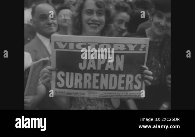 1945 - Huge crowds of civilians and servicemen take to the streets of Chicago, Seattle and New ...