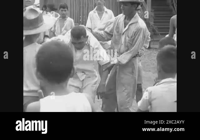 1945 - Filipino men who collaborated with the Japanese Army are ...