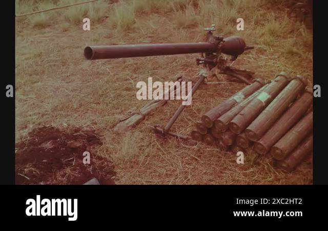1965 - American soldiers go over a stockpile of weaponry in Vietnam ...