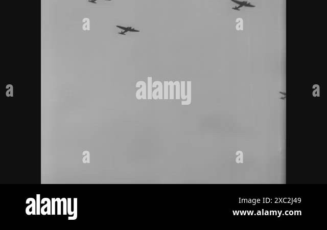 1930s - Luftwaffe planes fly above a military parade, where Adolf ...