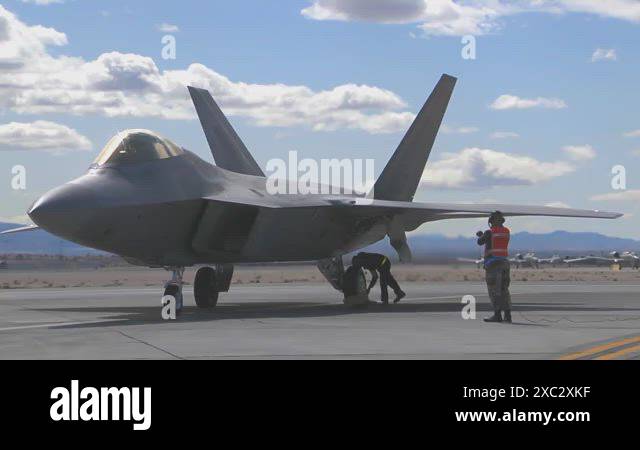 Maintenance crews work on an Air Force F-35 fighter jet Stock Video ...
