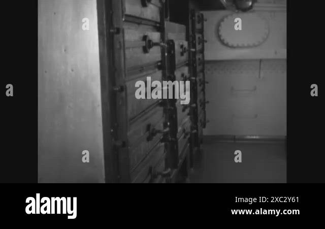1944 - US Navy bakers take loaves of bread out of the oven on the USS ...
