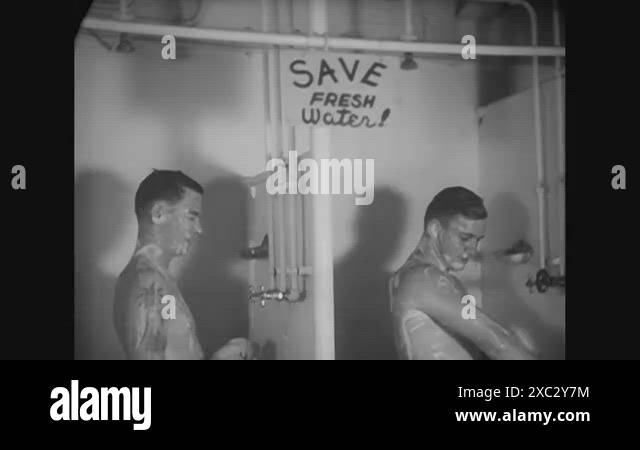1944 - Two US Navy sailors shower aboard the USS Enterprise Stock Video ...