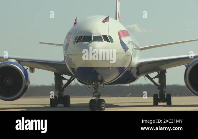 British Prime Minister David Cameron emerges from a British Airways ...