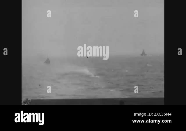 1945 - US Navy seamen rescue a pilot whose plane ran overboard on their ...