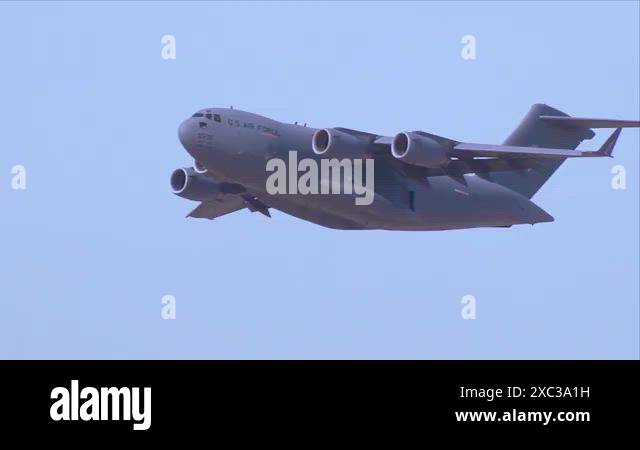 Cargo is dropped via parachute from a U.S. Air Force C-130 Globemaster ...