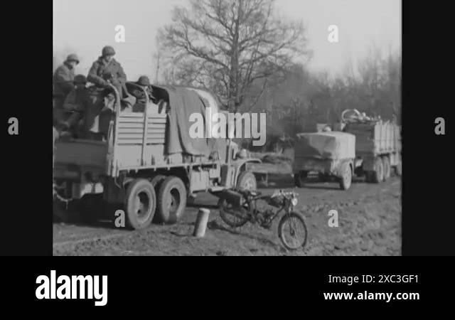 1945 - A convoy of vehicles from the US Army's 5th Armored Division ...