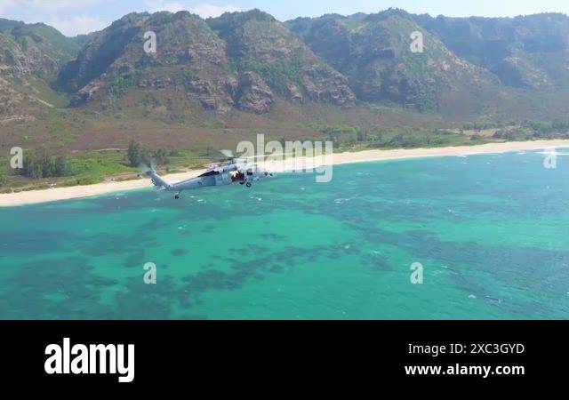 2018 - Air-to-Air aerial video of UH-60 Seahawk helicopter flying off ...