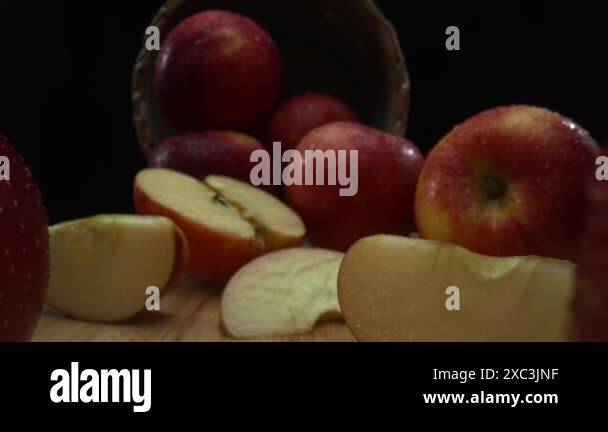 Macrography, slices of fresh apple are arranged on a cutting board ...