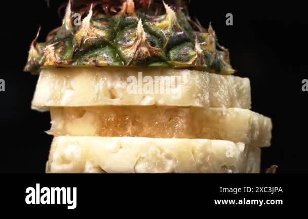 Close up video of fresh pineapple with slice of peel pineapple insert ...