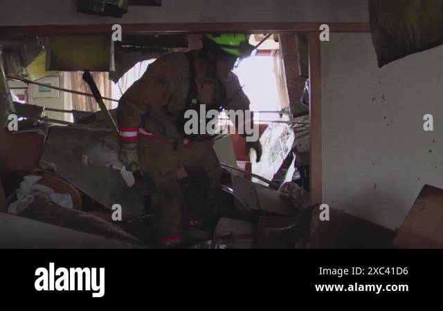 Search and rescue teams hunt for survivors following the devastating ...