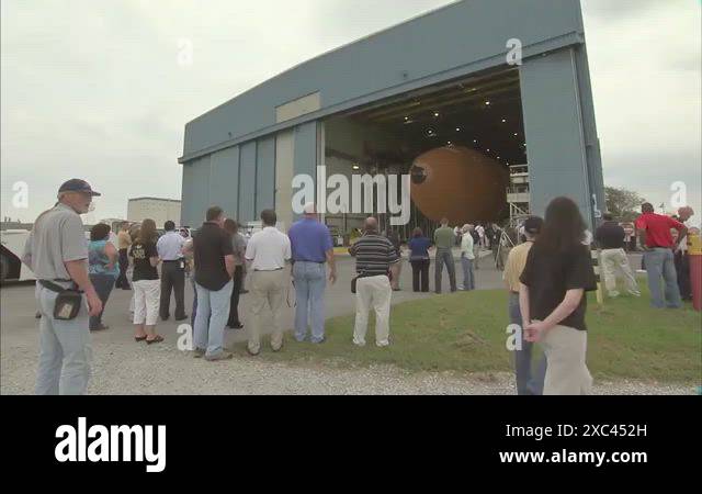 The huge external fuel tanks of the Space Shuttle are wheeled out Stock ...