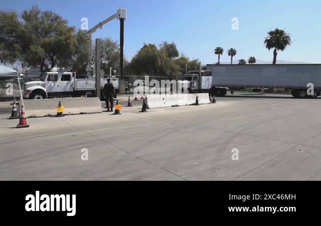 Commercial trucks and cars passing through the U.S. Mexico border are ...