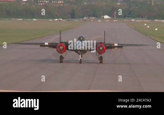 Vintage classic WW2 era airplanes taxi and take off from an airshow ...